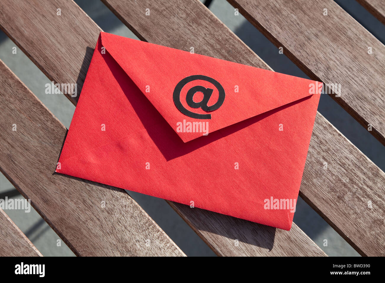 Red Envelope with @ Symbol, concept of E-Mail Stock Photo - Alamy