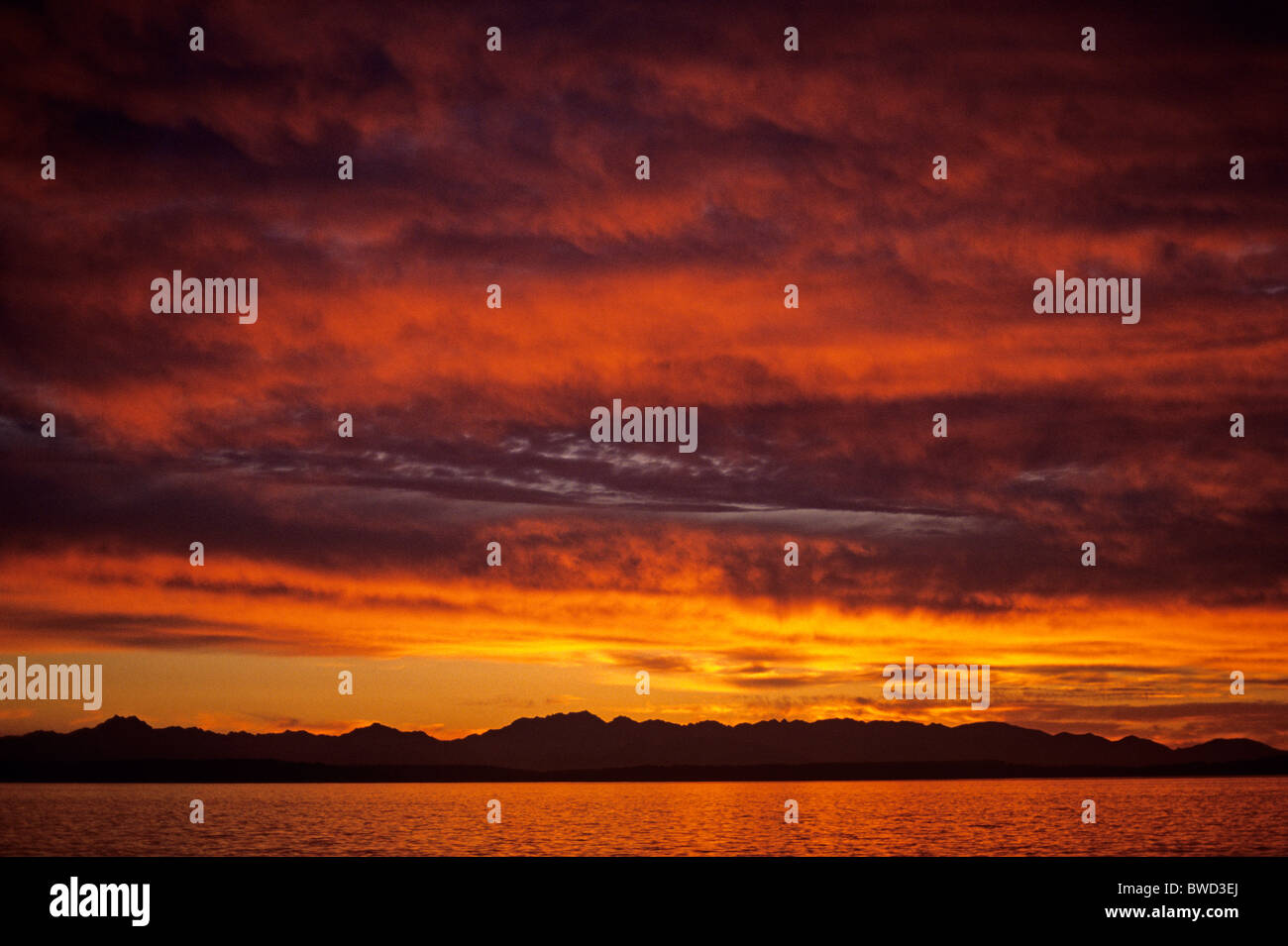 Dramatic sunset over Puget Sound and Olympic Mountain Range ...