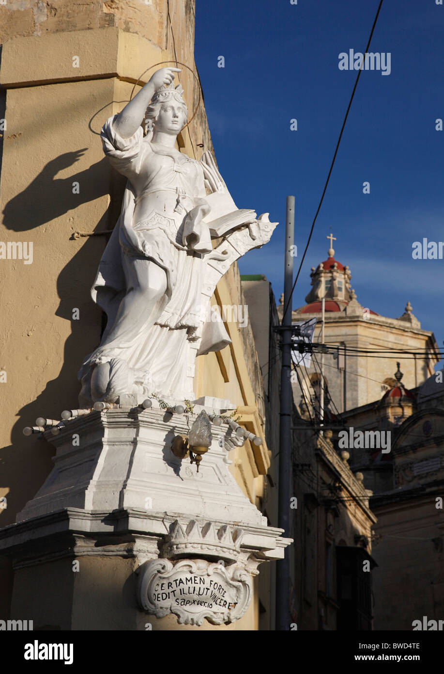 An old statue of the medieval saint St Catherine of Alexandria and the ...