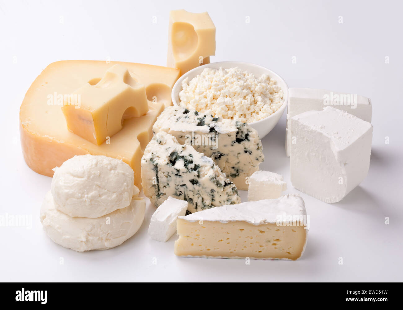 Various types of cheeses on a white background Stock Photo - Alamy
