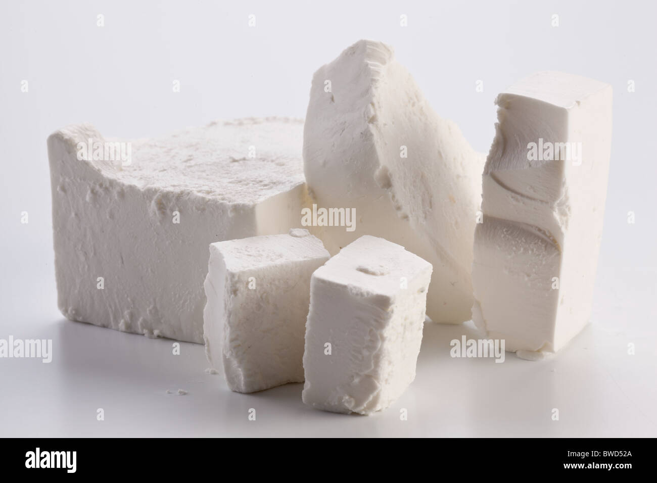 Feta cheese on a white background Stock Photo - Alamy
