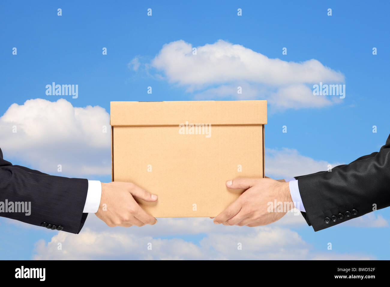 Package handover hi-res stock photography and images - Alamy