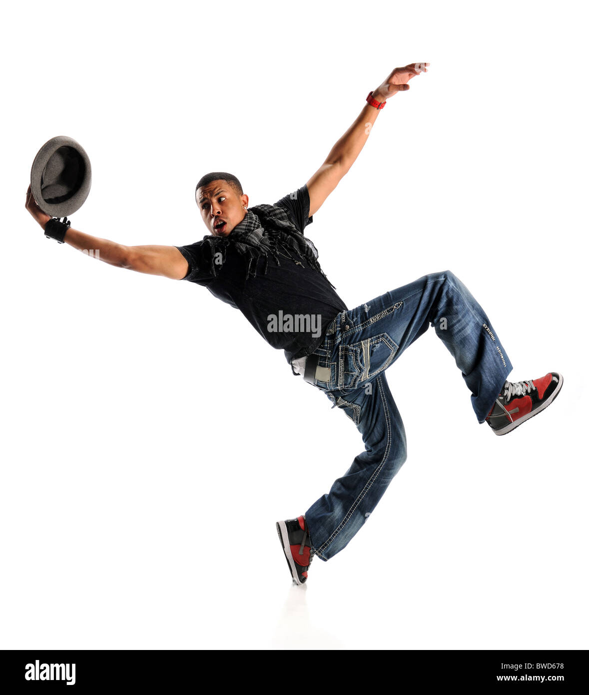 African American hip hop dancer performing with hat isolated over white ...