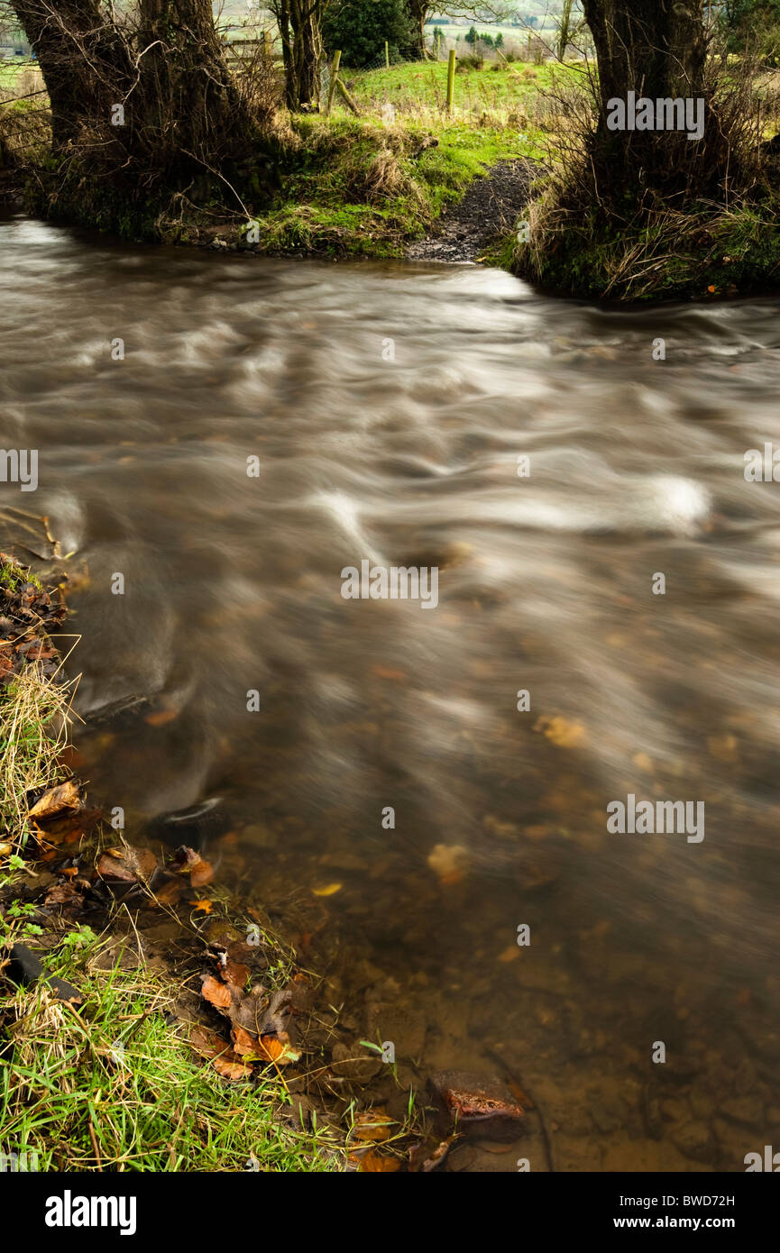 Water flowing along a stream near Chipping in Lancashire, United ...