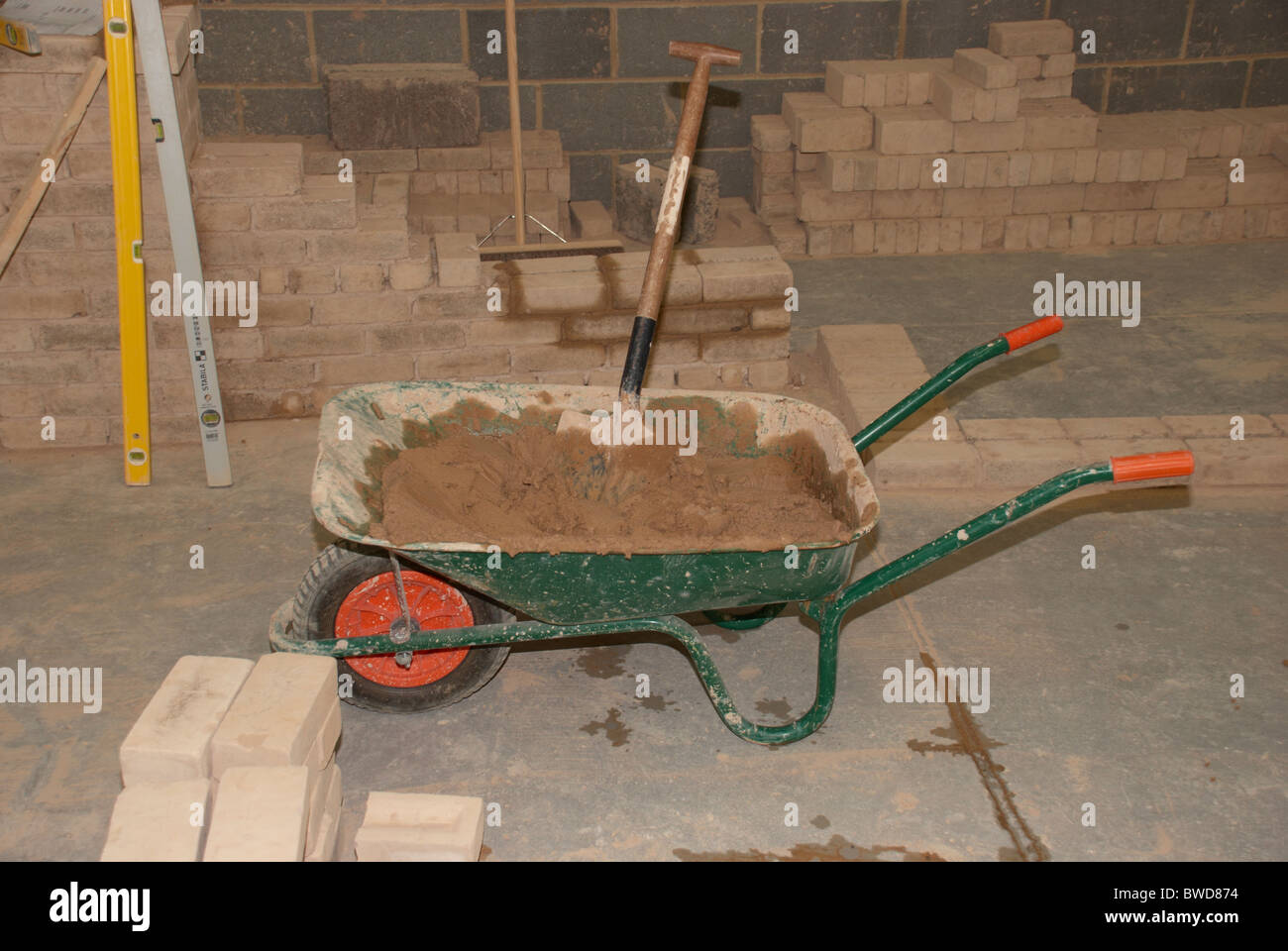 A wheelbarrow with bricks hi-res stock photography and images - Alamy