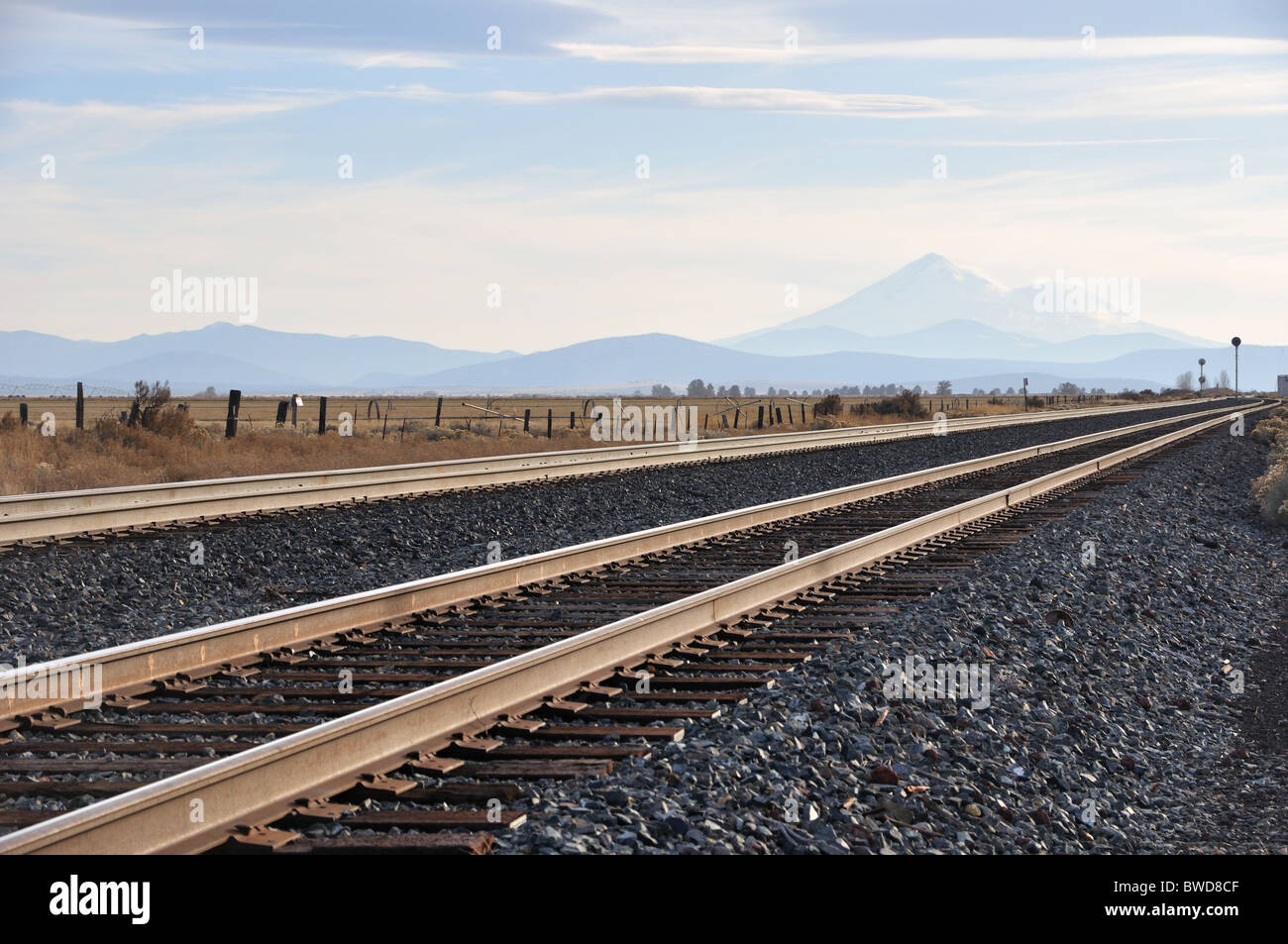 Railroad tracks with Mt. Shasta in Northern California Stock Photo - Alamy
