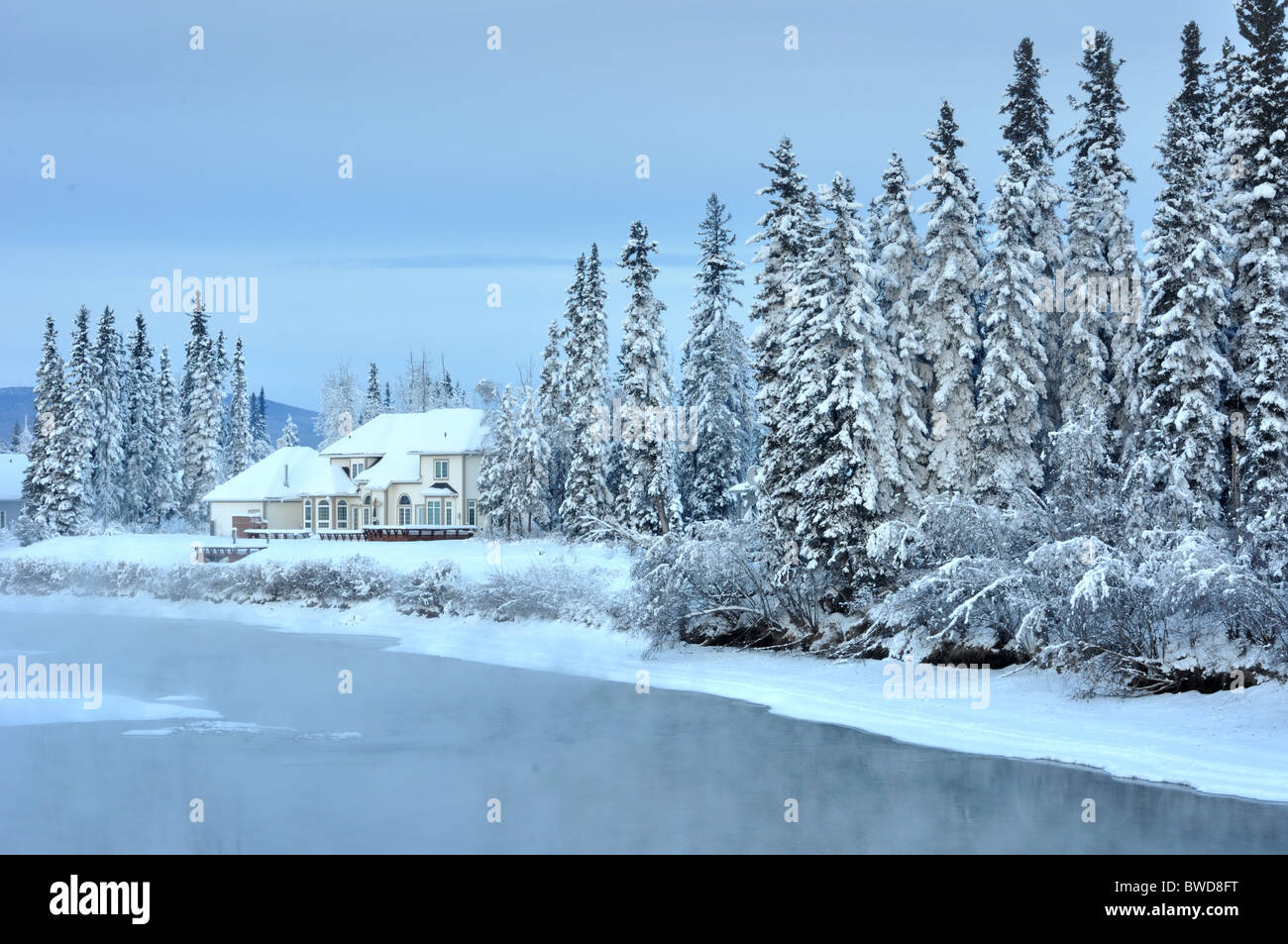 House on an Alaska River in Winter Stock Photo - Alamy