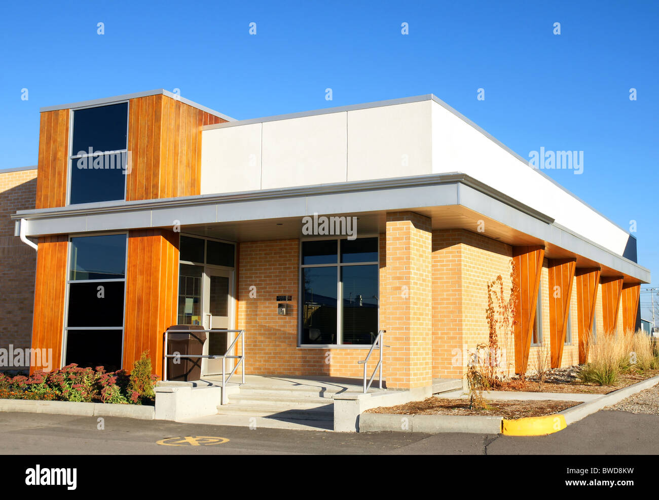 Small modern public office building mixing wood and brick material ...