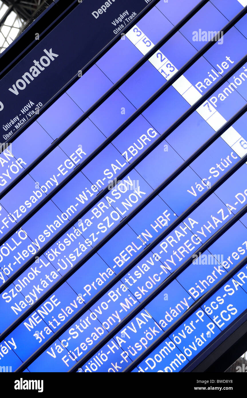 Timetable display screen of arrivals and departure Stock Photo - Alamy