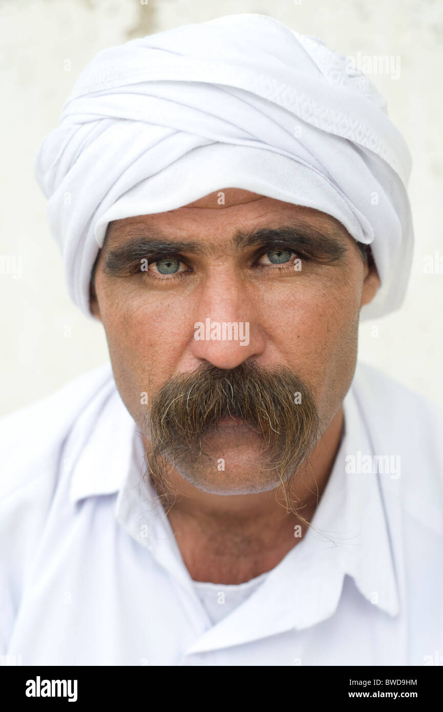 A portrait of a young Yezidi Kurdish man, who belongs to a persecuted ...