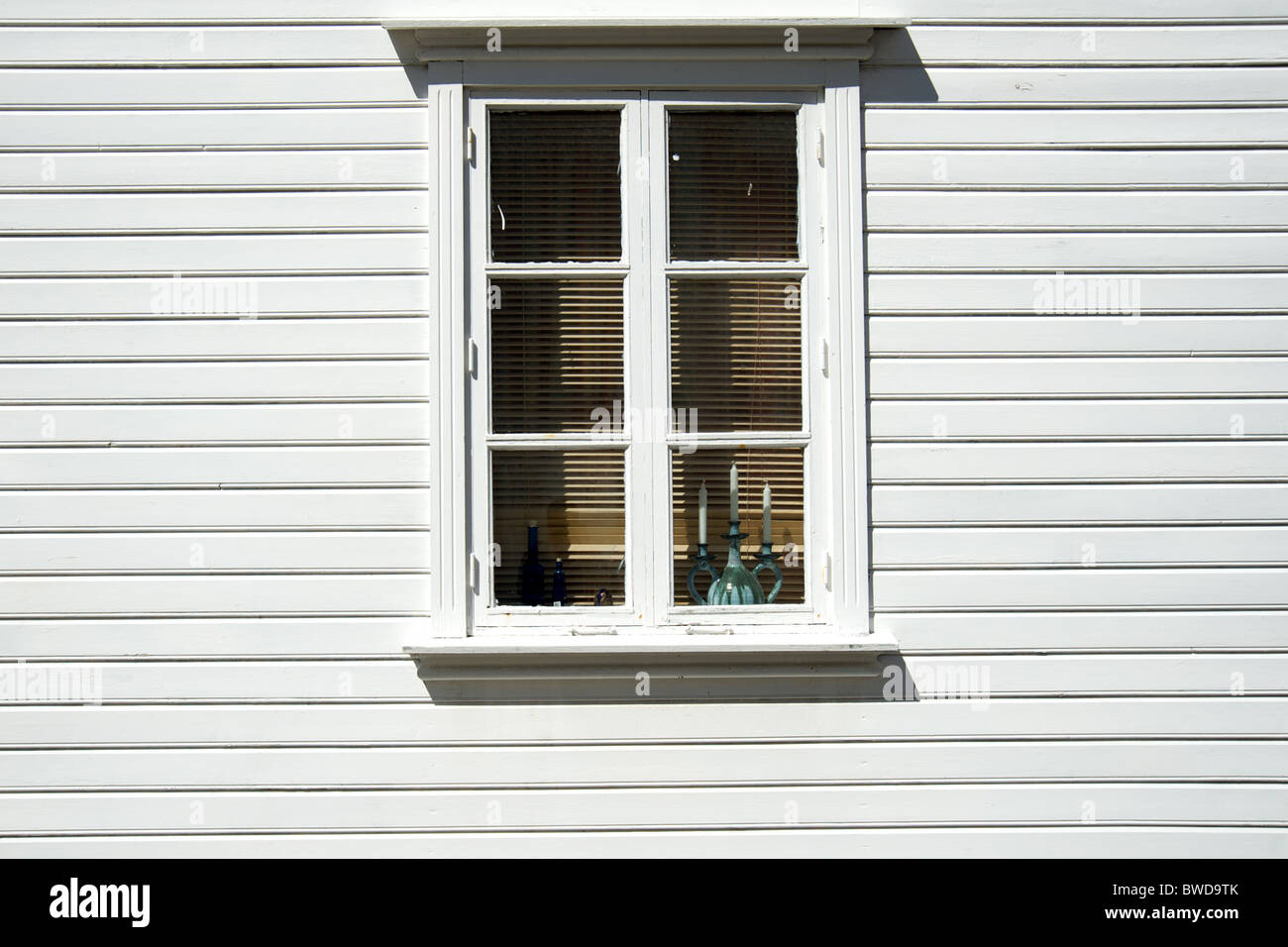A window of a traditional white wooden house in the old 'Gamle ...