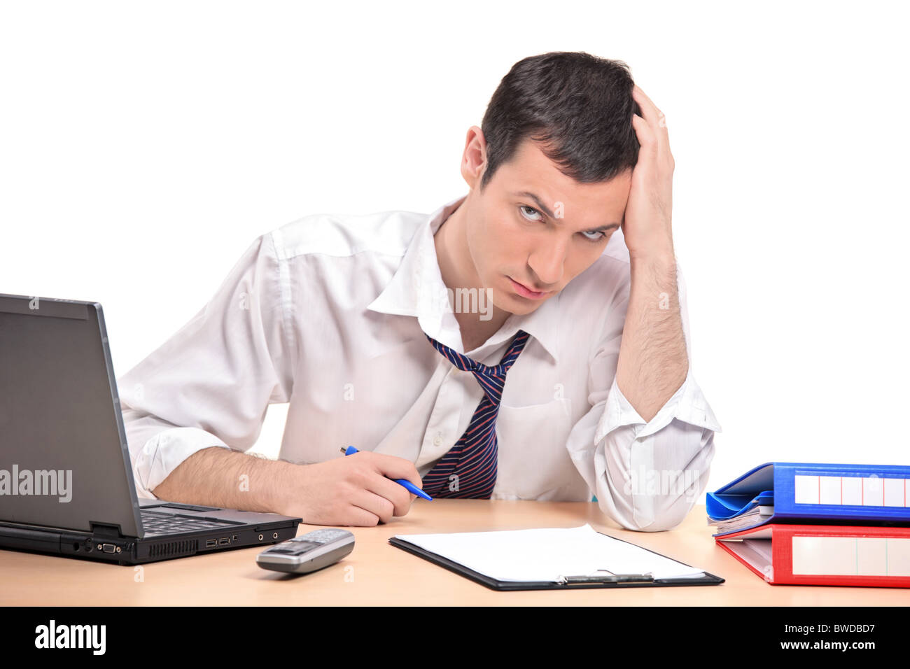 A desperate businessman in his office Stock Photo - Alamy