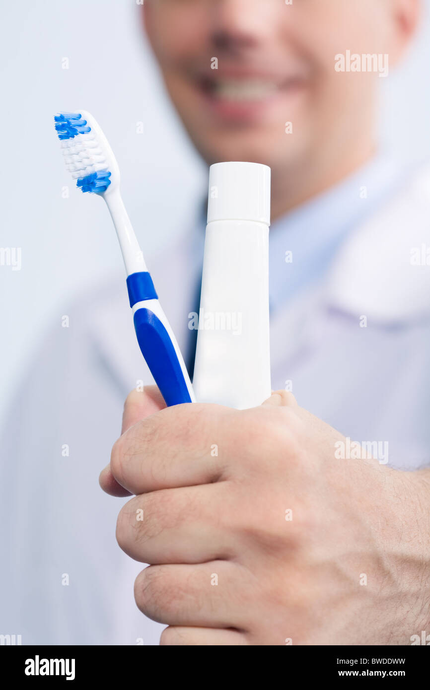 Hand holding molar hi-res stock photography and images - Alamy