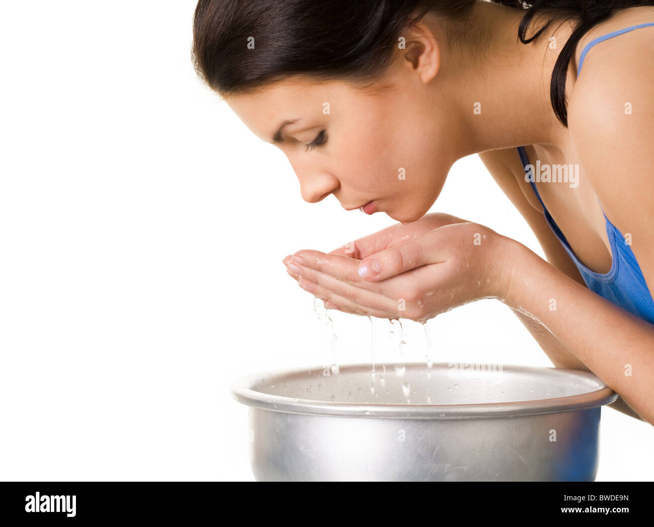 Profile of fresh female washing her face from wash-basin Stock Photo ...
