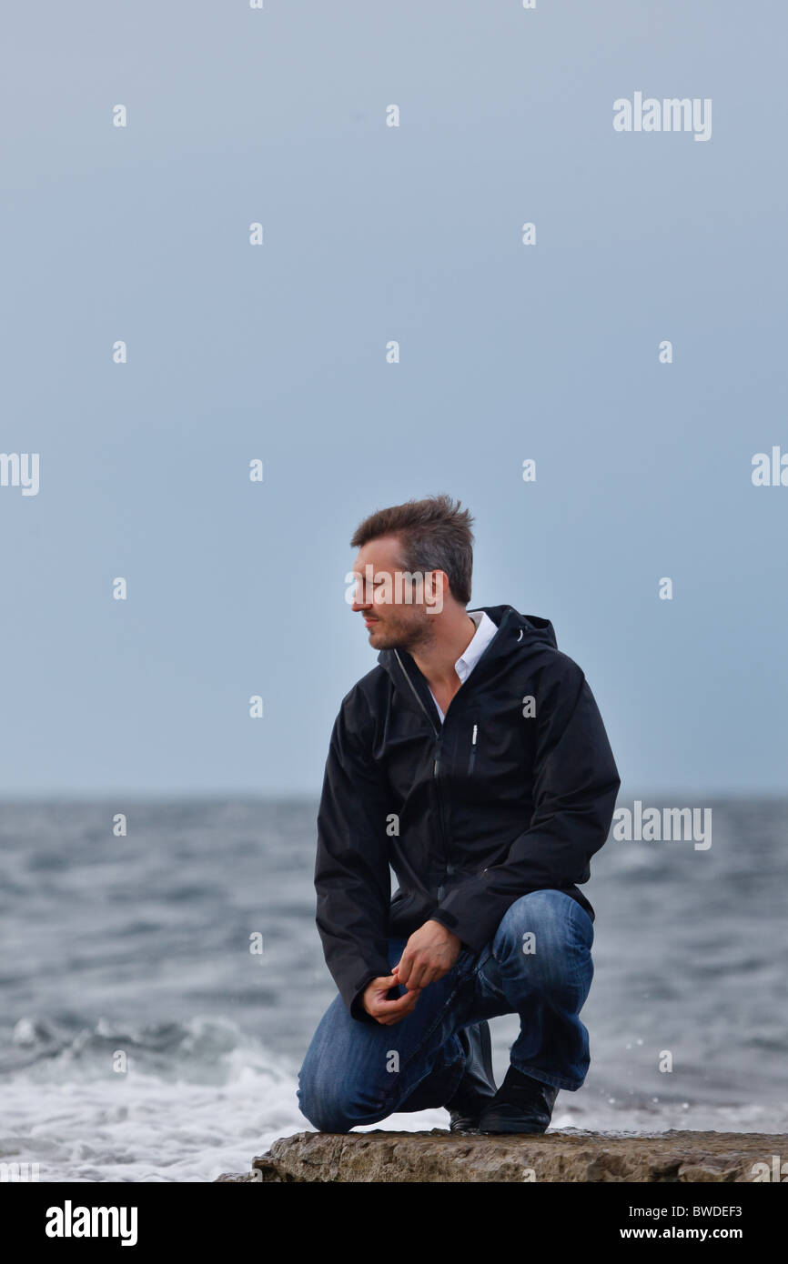 Man by the sea Stock Photo - Alamy