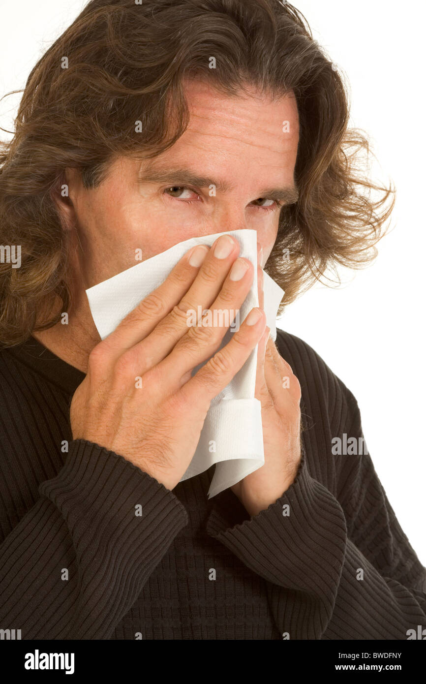 Middle-aged male covers his nose part of the face by paper towel or ...