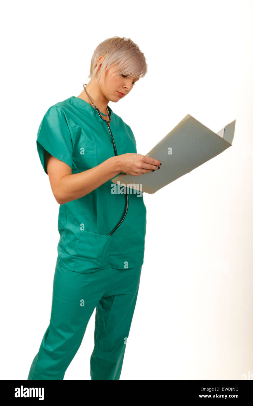 Young female doctor holding patients notes Stock Photo - Alamy