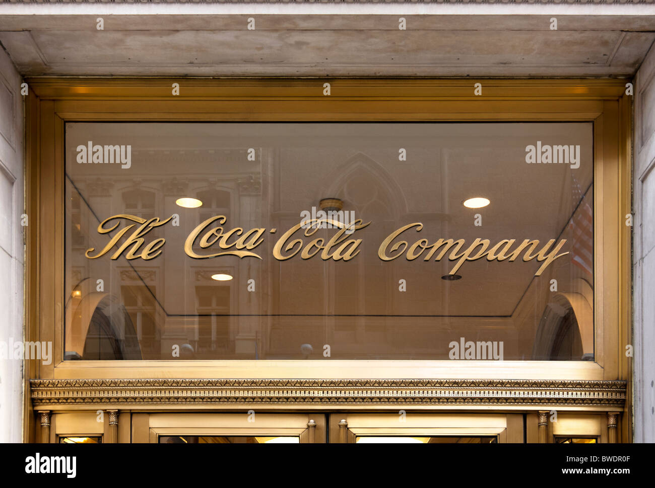 Window above Entrance to Coca-Cola Company Building, with name "The ...