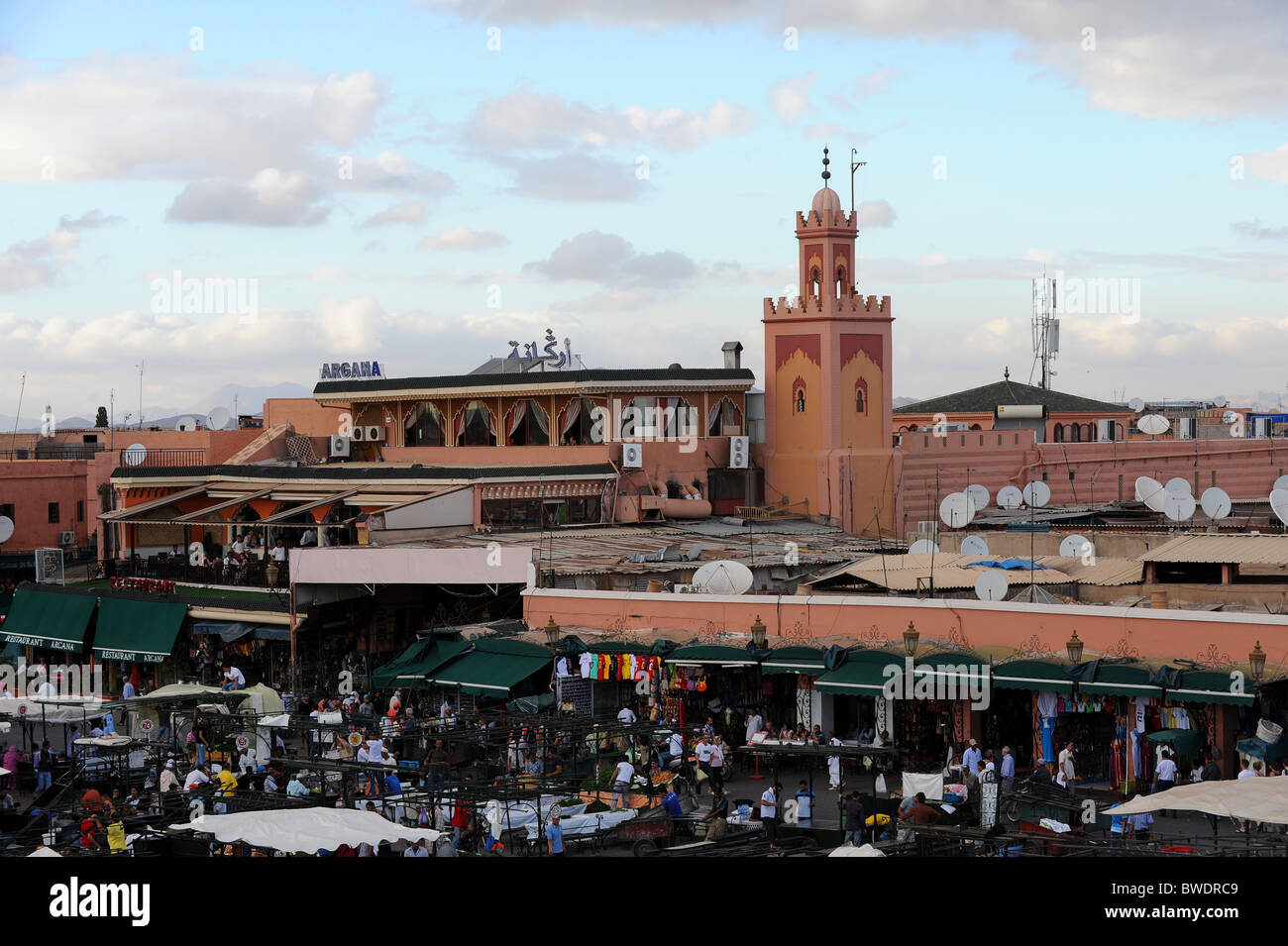 Djemaa El Fna Square in Marrakech with food stalls and crowds at night ...