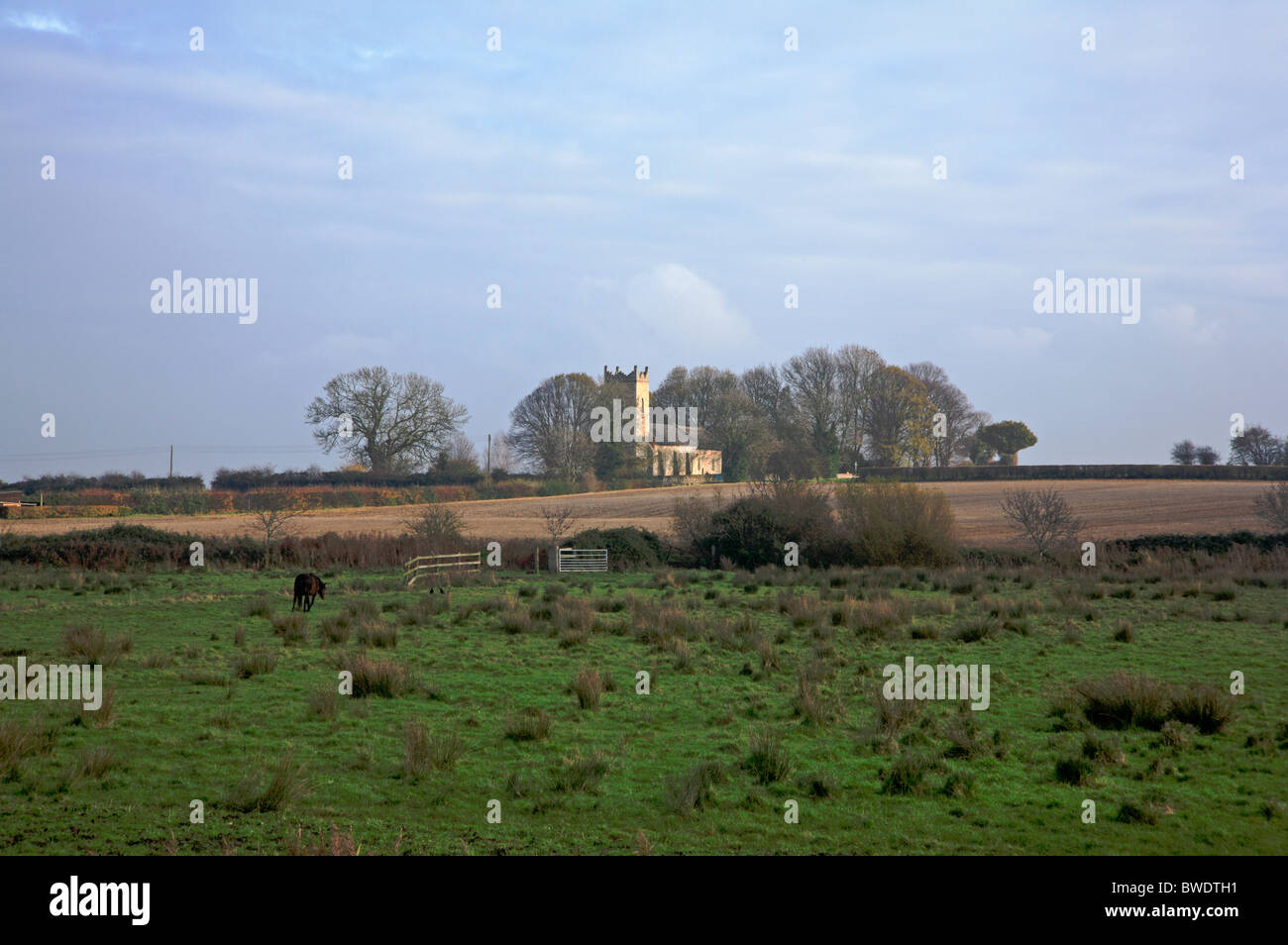 A rural landscape featuring the Church of Saint Edmund on the Norfolk ...