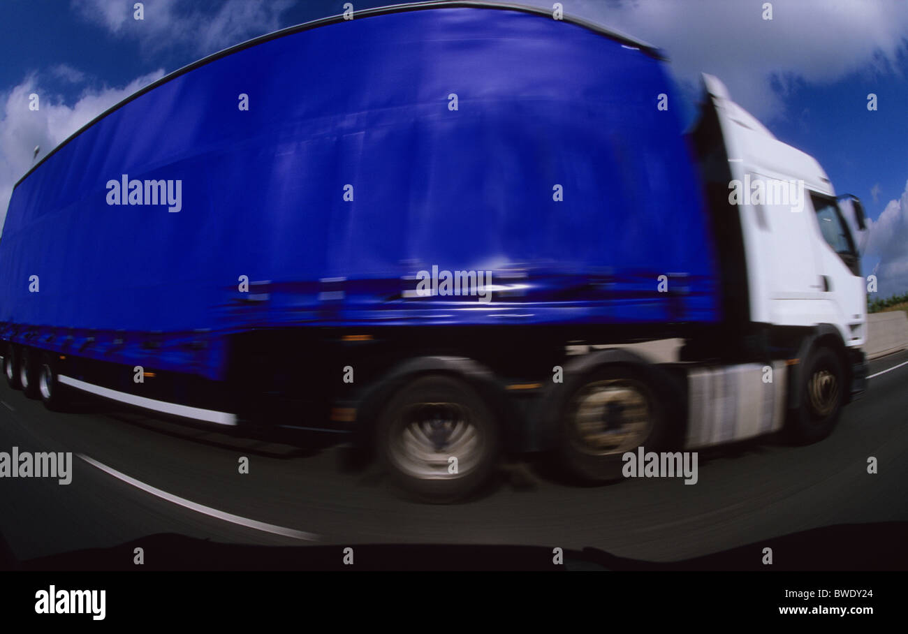 vehicle overtaking articulated lorry on the a1 m1 motorway near leeds ...