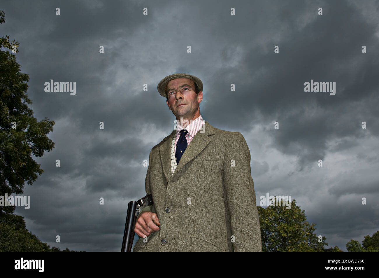 Old man standing gun hi-res stock photography and images - Alamy