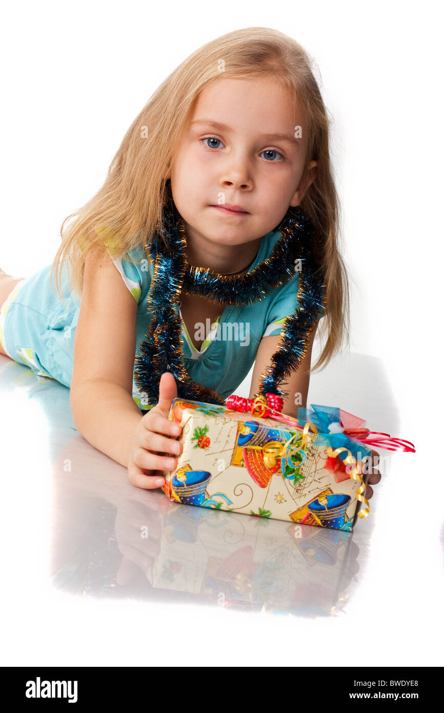 Beautiful girl with a present isolated Stock Photo - Alamy