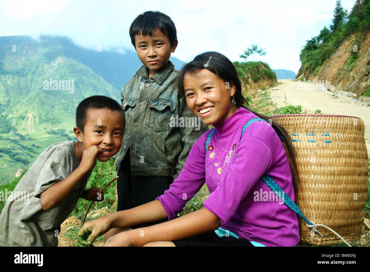 Two Hmong kids and their sister in Sapa, Vietnam Stock Photo - Alamy