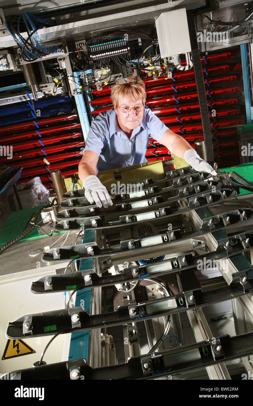 female worker in car manufacturing industry Stock Photo - Alamy