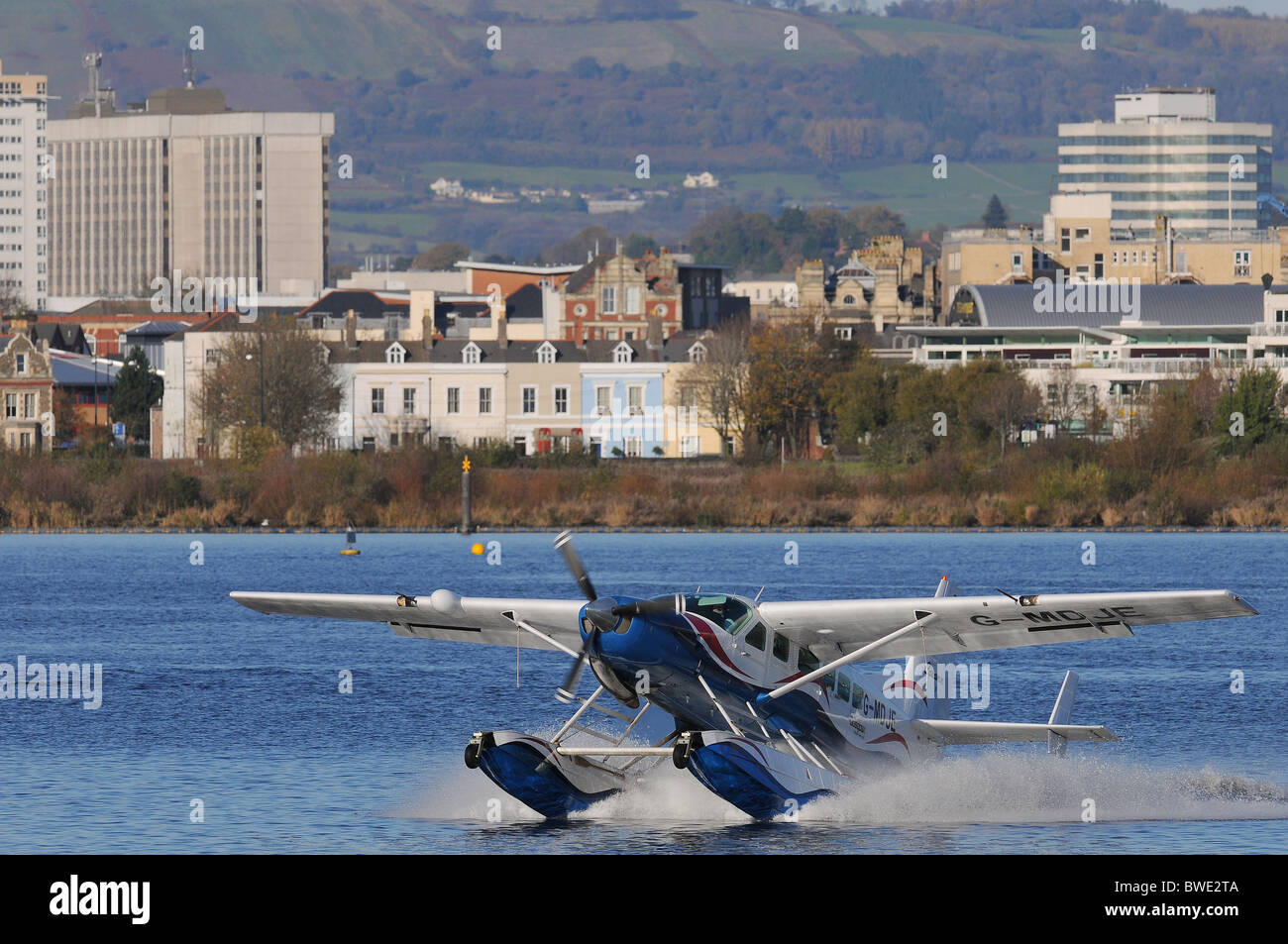 A Cessna 208 Caravan seaplane takes off in Cardiff Bay in the Welsh ...