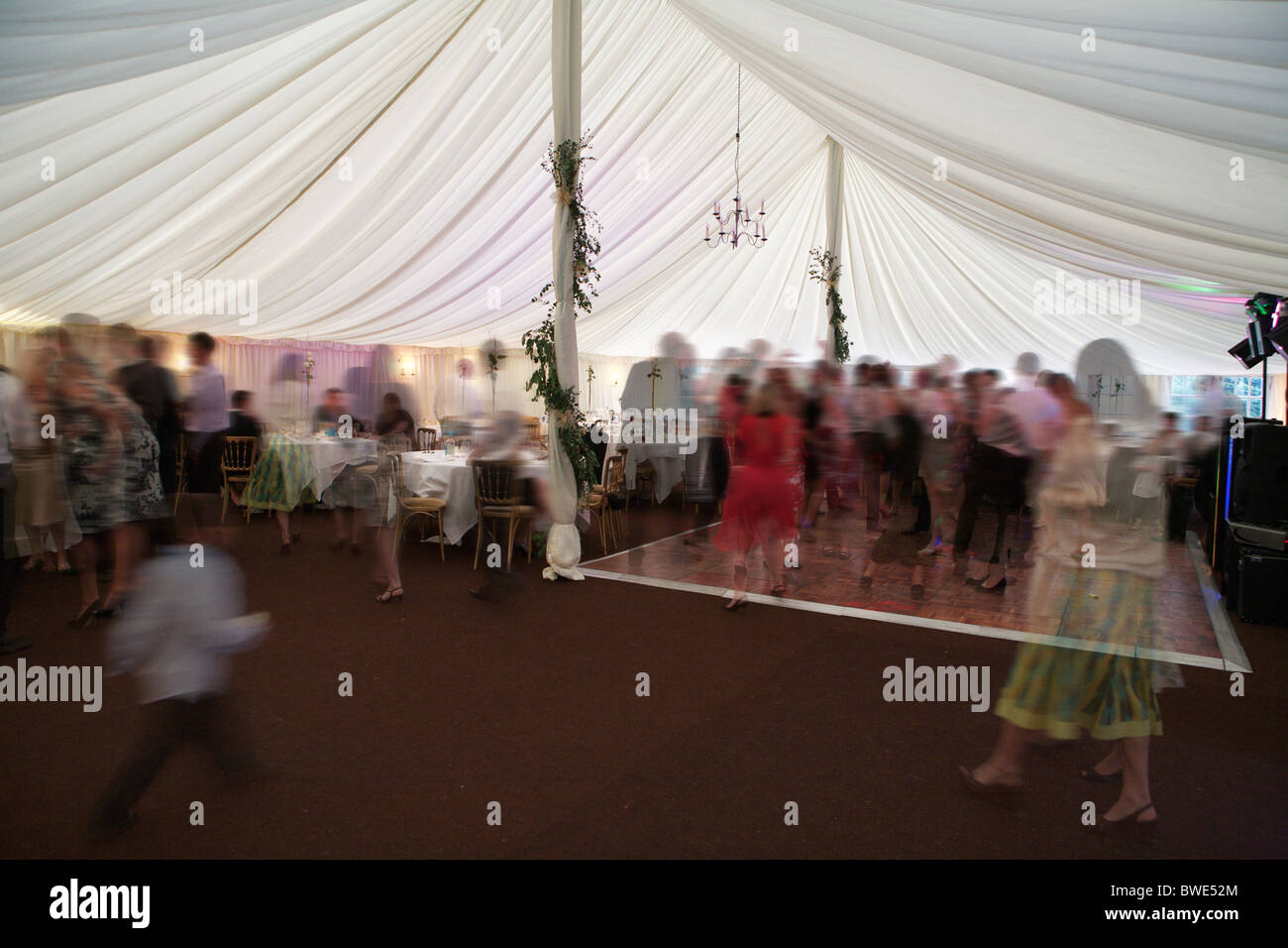 people dancing in a marquee having fun Stock Photo - Alamy