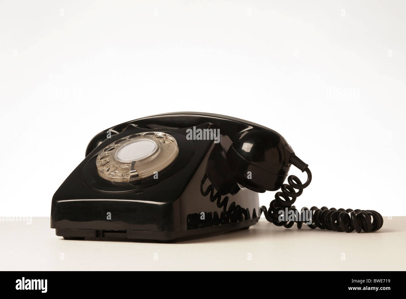black old bt telephone on white background Stock Photo - Alamy