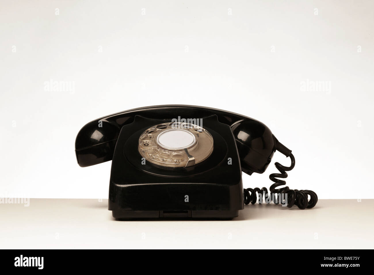 black old bt telephone on white background Stock Photo - Alamy