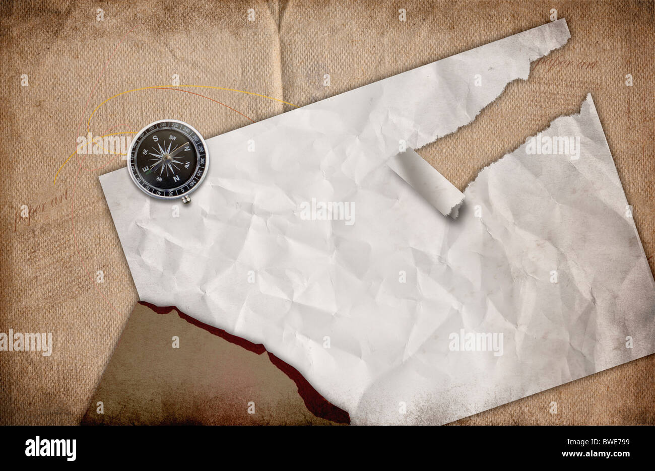 compass and torn paper background Stock Photo - Alamy