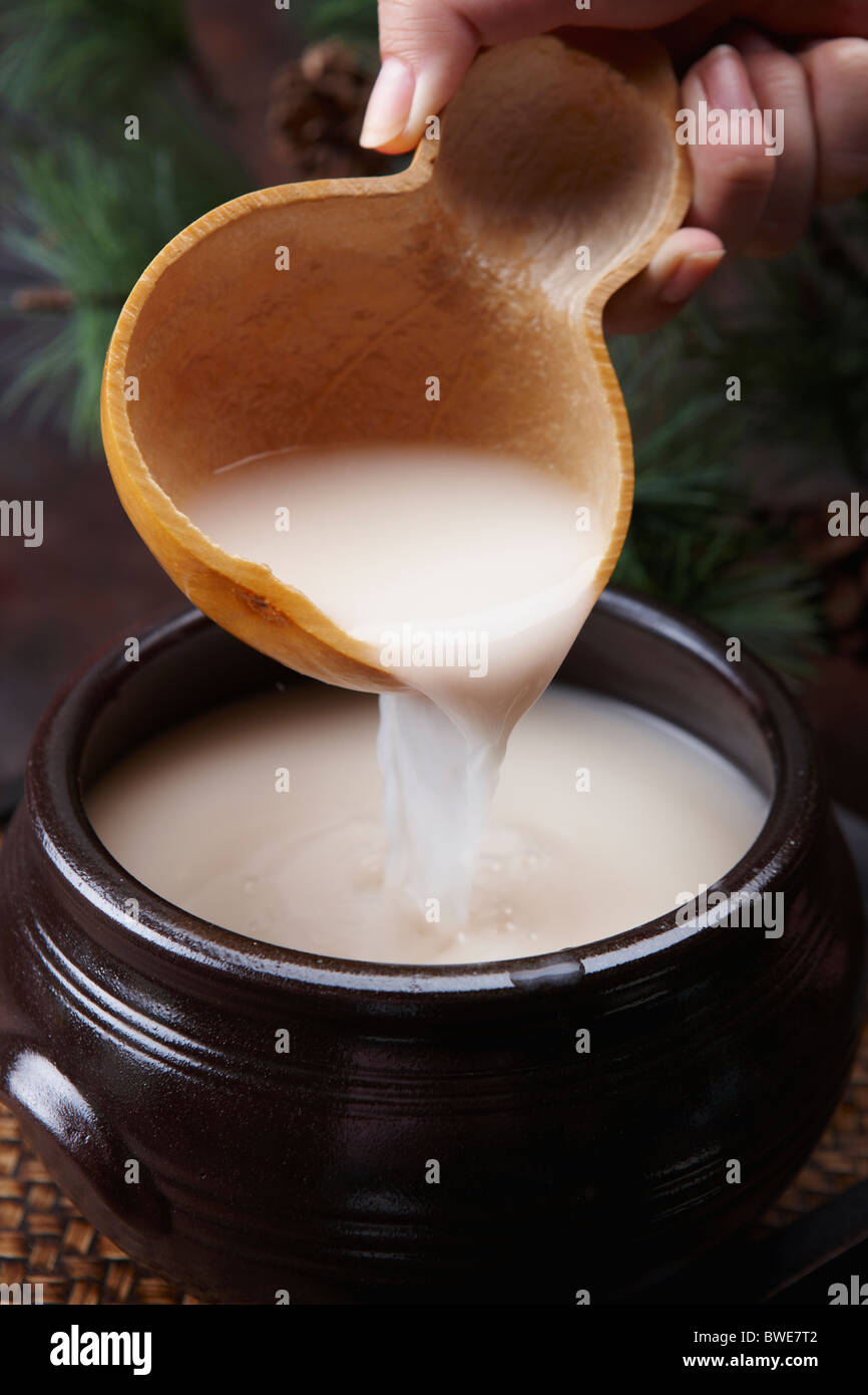 pouring Korean traditional alcohol made from grain Stock Photo - Alamy