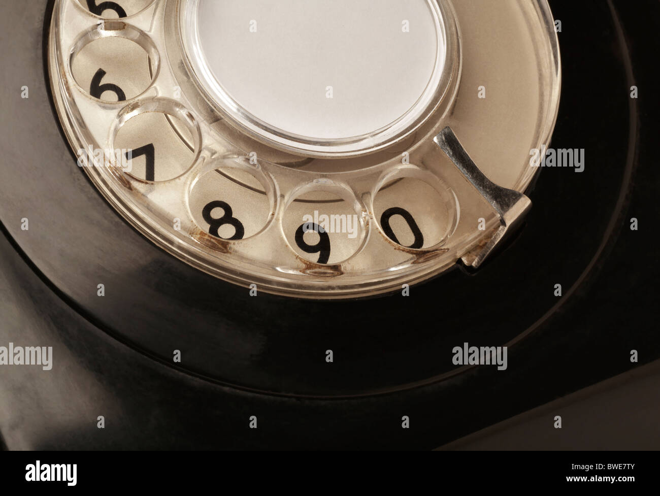 black old bt telephone on white background close up detail of rotary ...