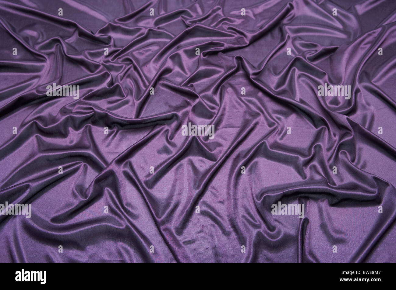 wrinkled purple textile Stock Photo - Alamy