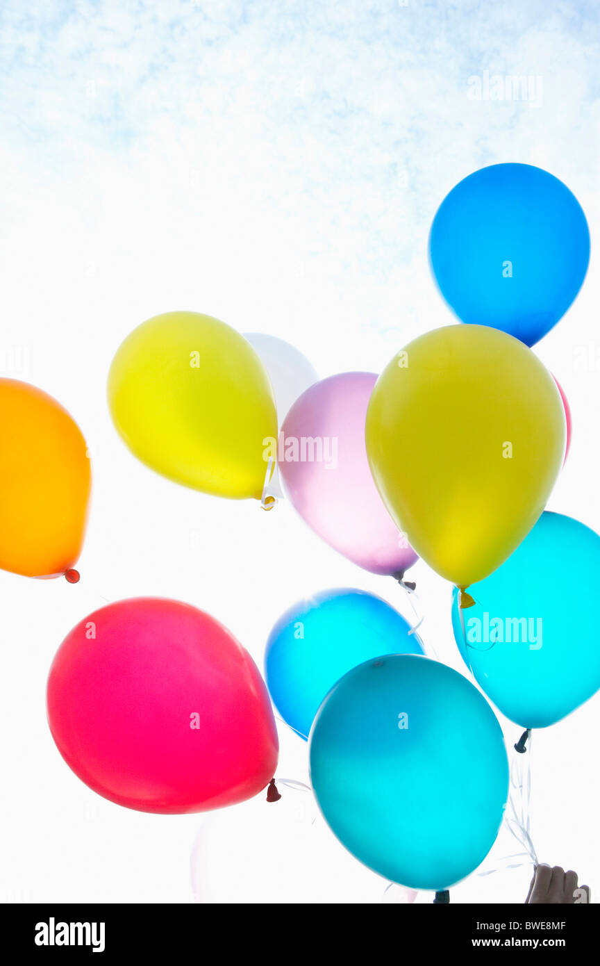 multi colored balloons flying to the sky Stock Photo - Alamy