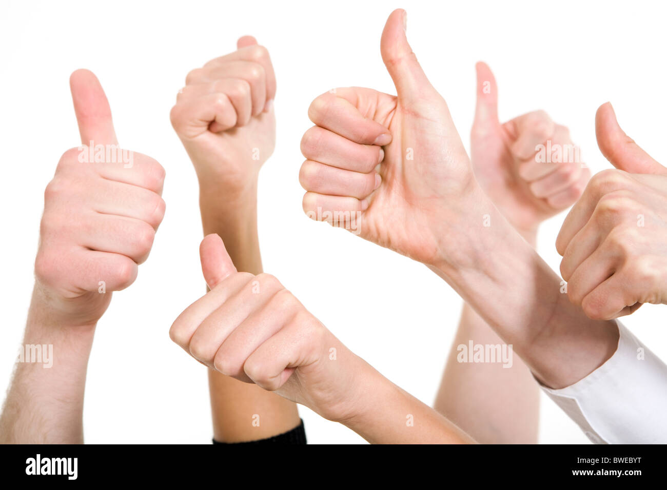 Line of group of human fists keeping thumbs up Stock Photo - Alamy