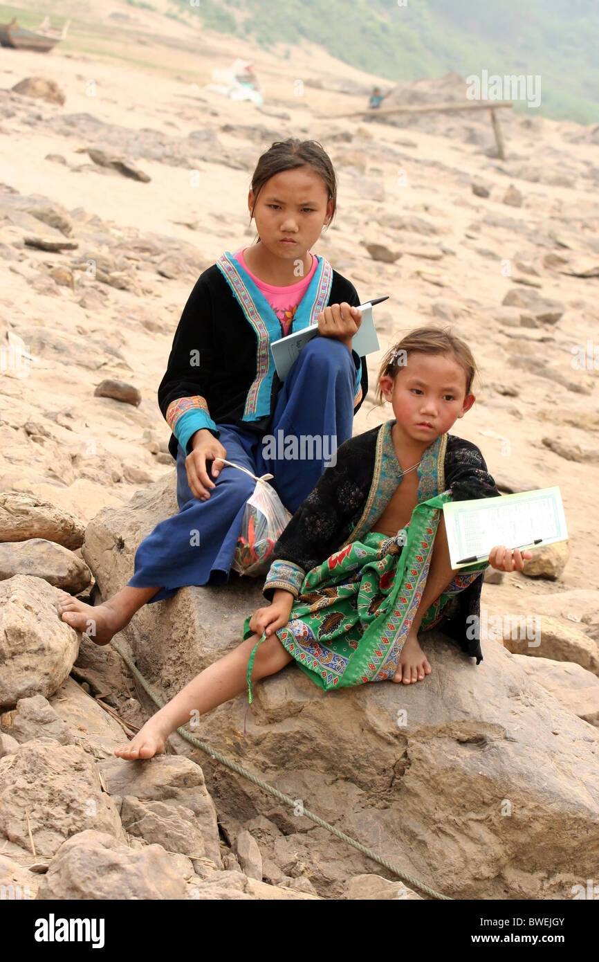 Hmong Child playing on the banks of the Mekong river between Pakbeng ...