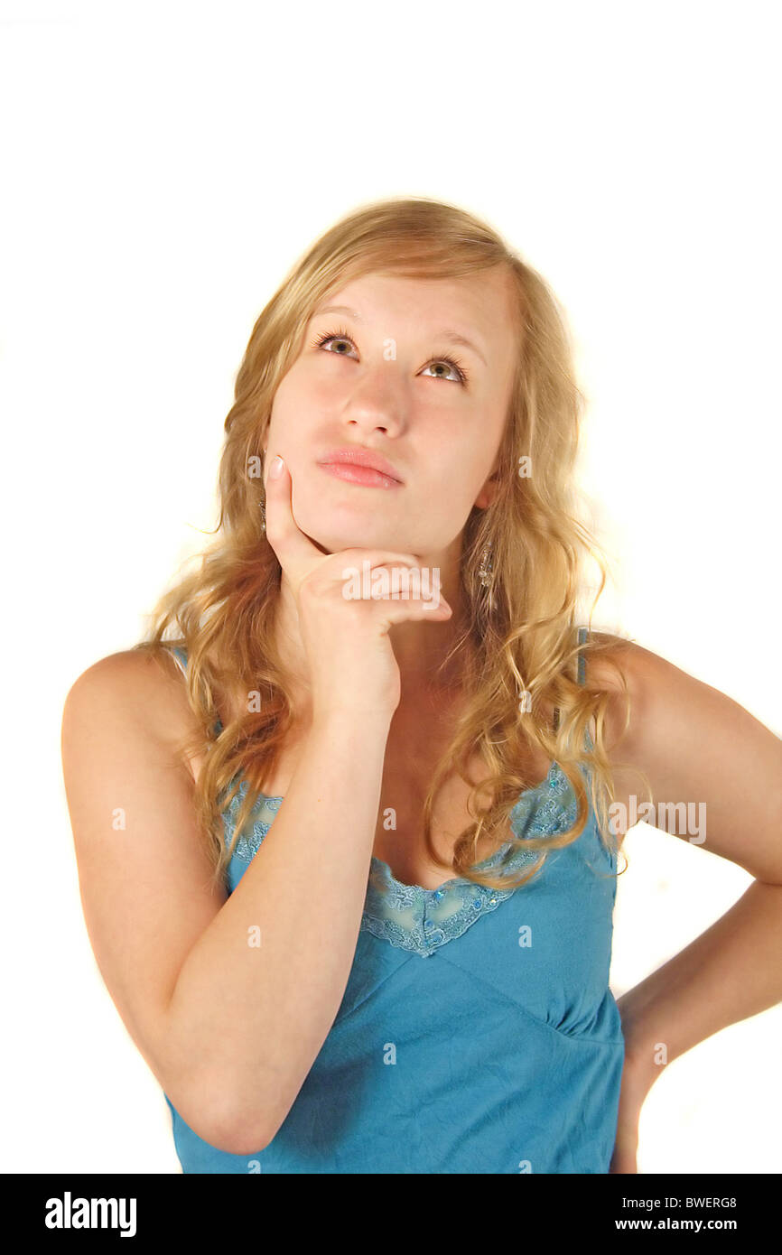 A young thoughtfully woman. All isolated on white background Stock ...
