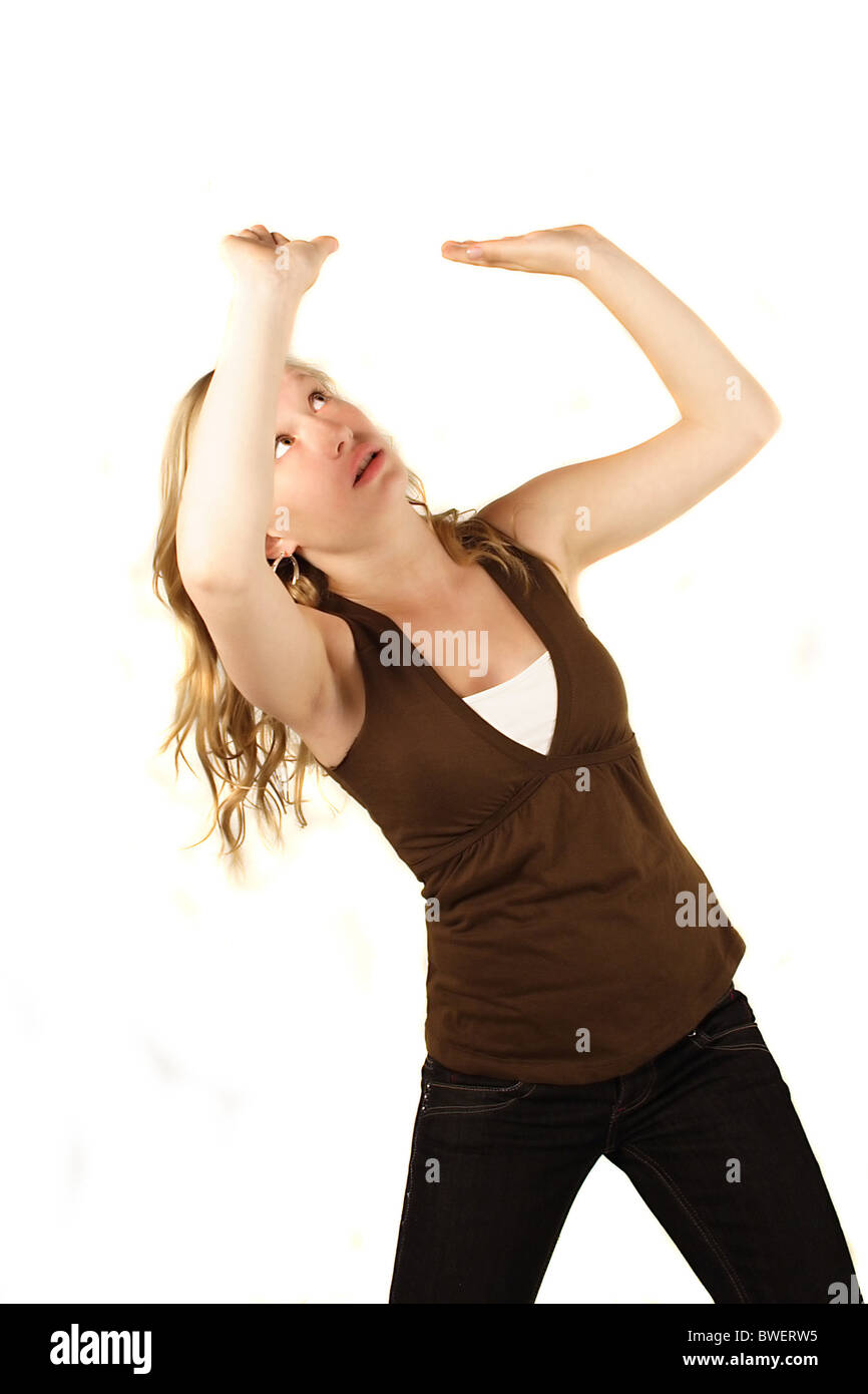 A young handsome has to stand a heavy weight. All isolated on white ...