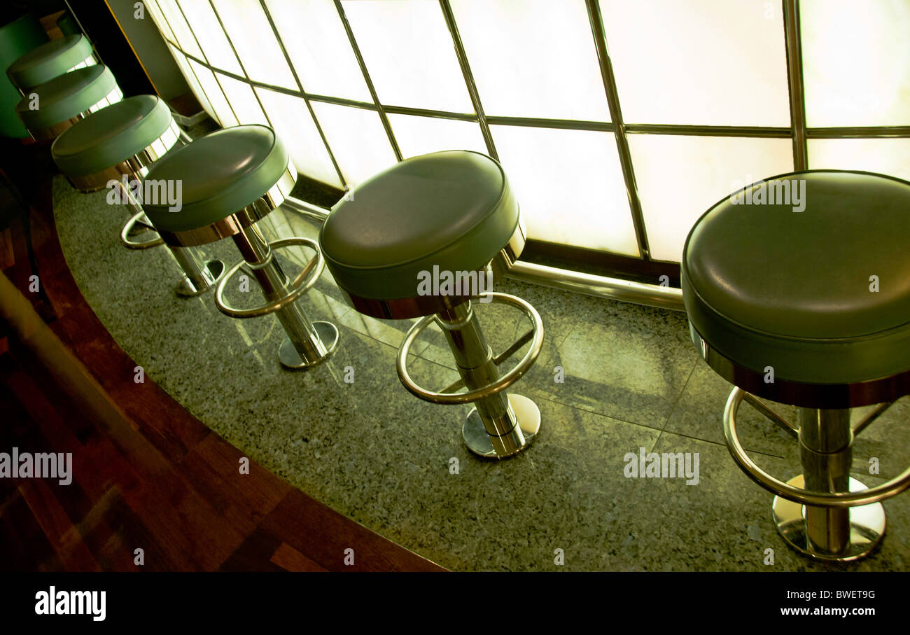 Bar stools on cruise ship Stock Photo - Alamy