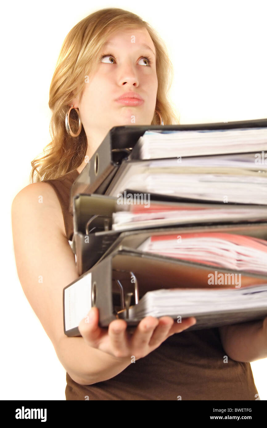 A young handsome woman got a lot of work to do. All isolated on white ...