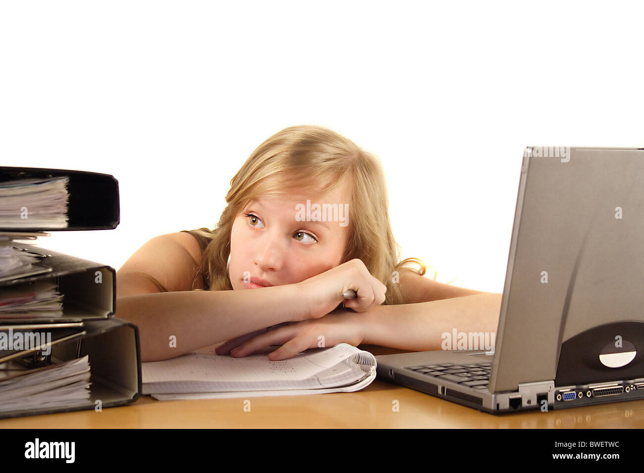 A young handsome woman got a lot of work to do. All isolated on white ...