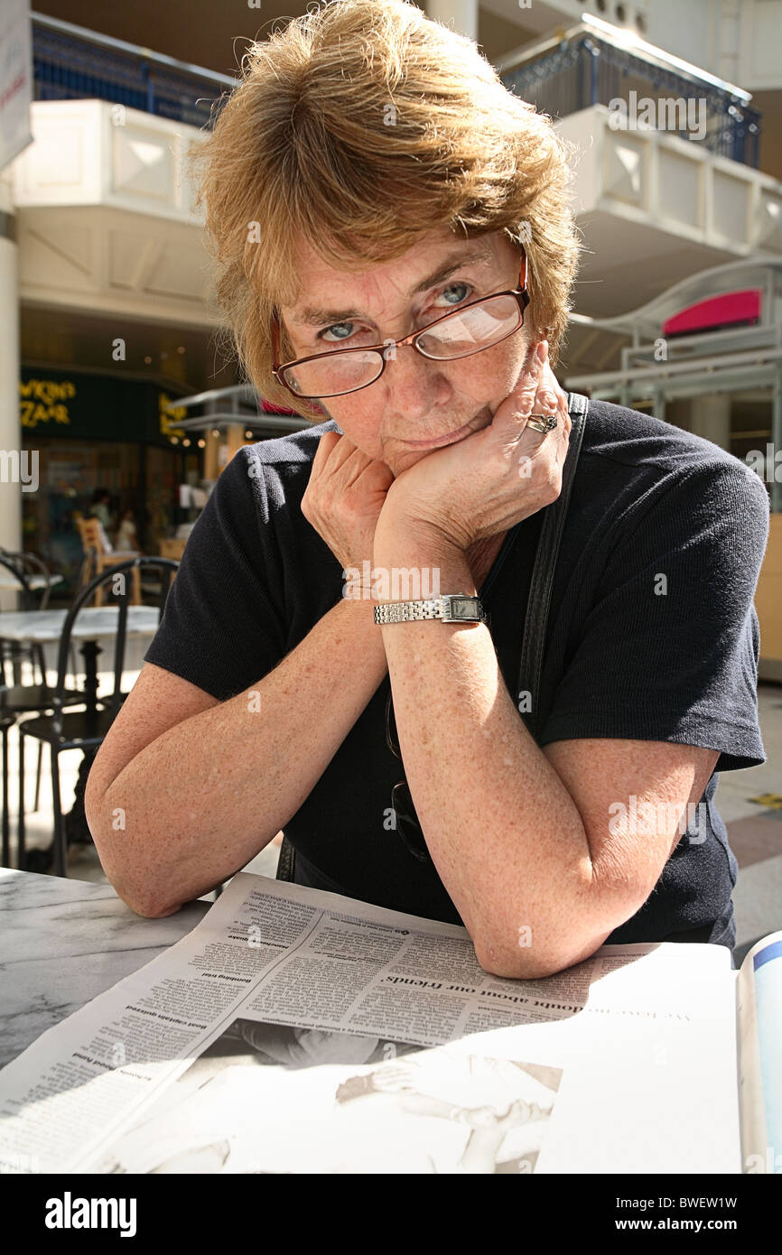 Woman staring at photographer Stock Photo - Alamy