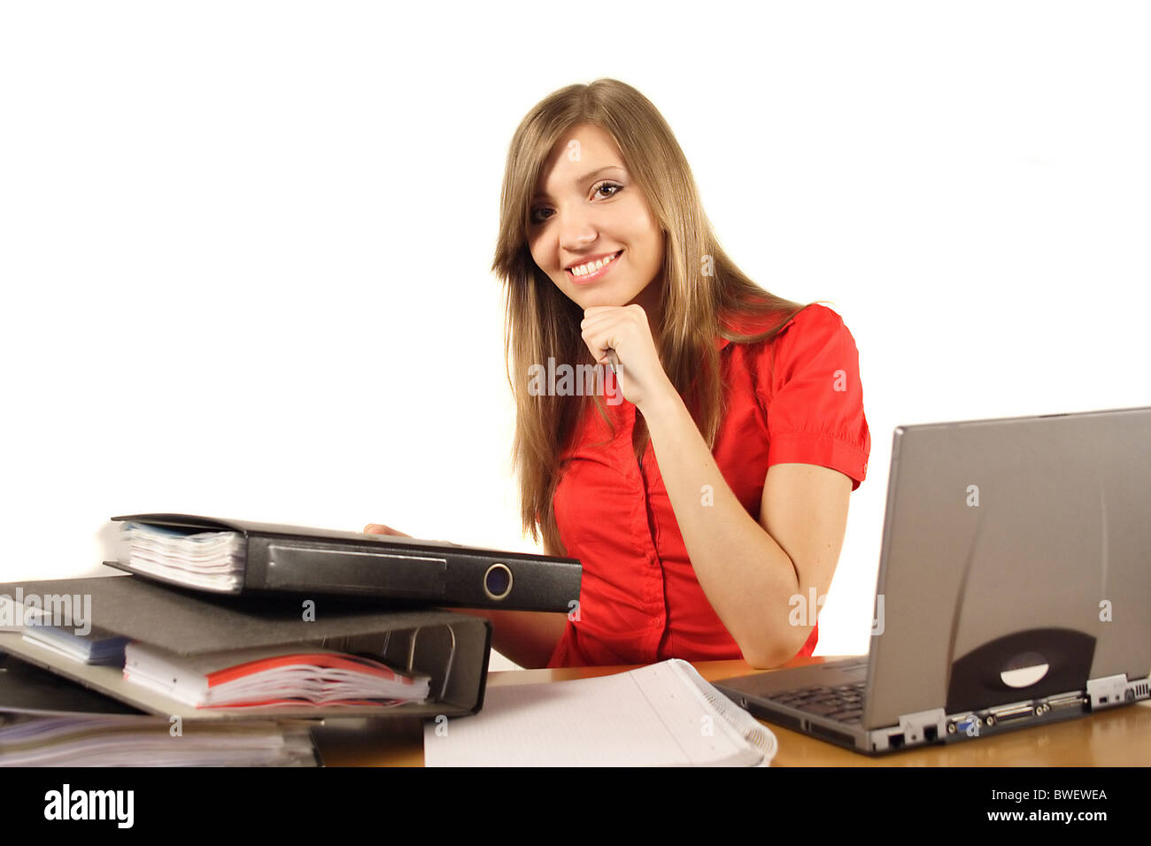 An attractive young student working. All on white background Stock ...