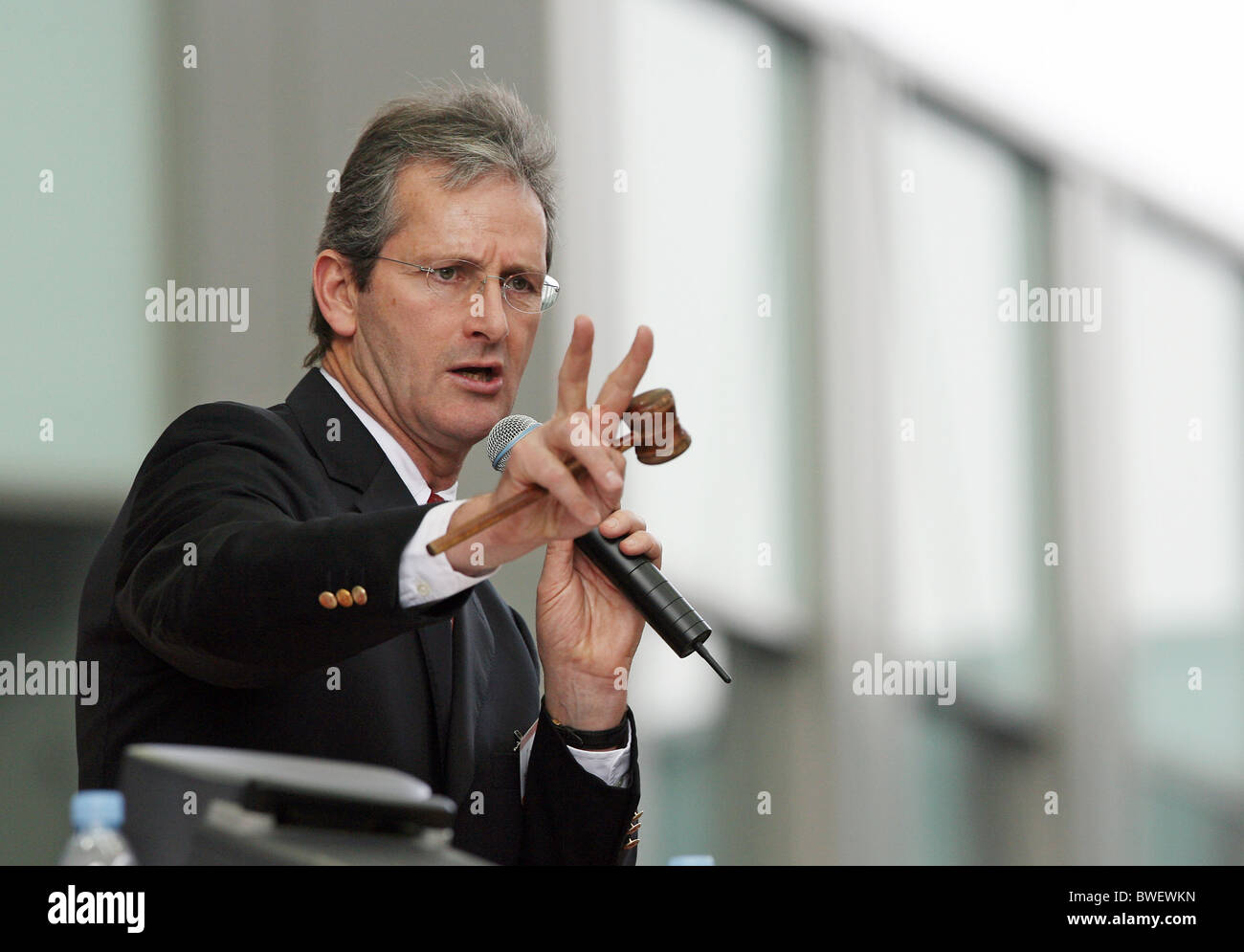 Auctioneer at an auction, Hong Kong, China Stock Photo - Alamy