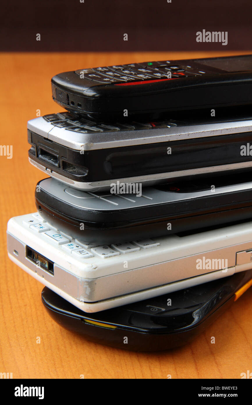 Many cell phones are on each other Stock Photo - Alamy