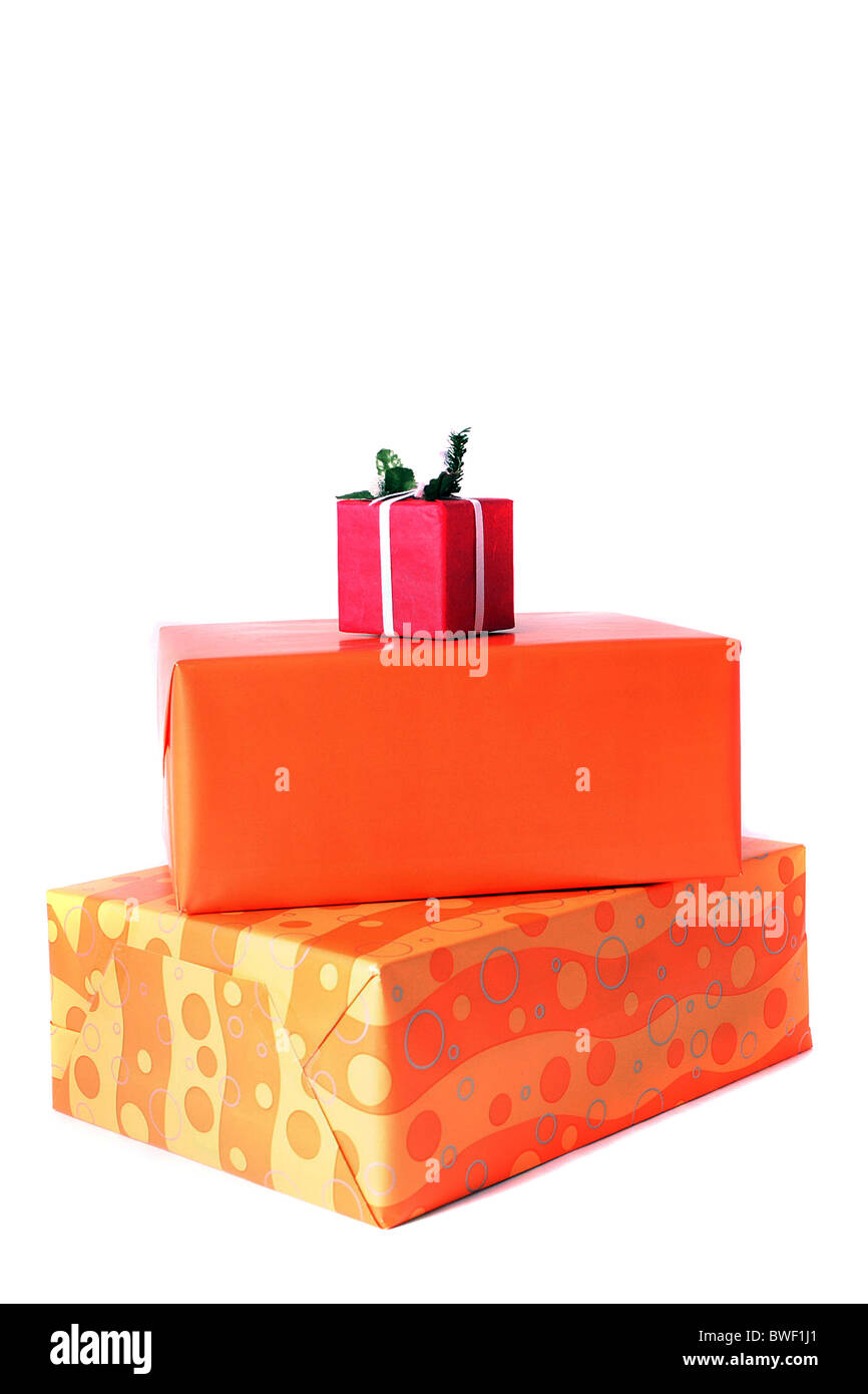 Several gifts in different sizes in front of white background Stock ...